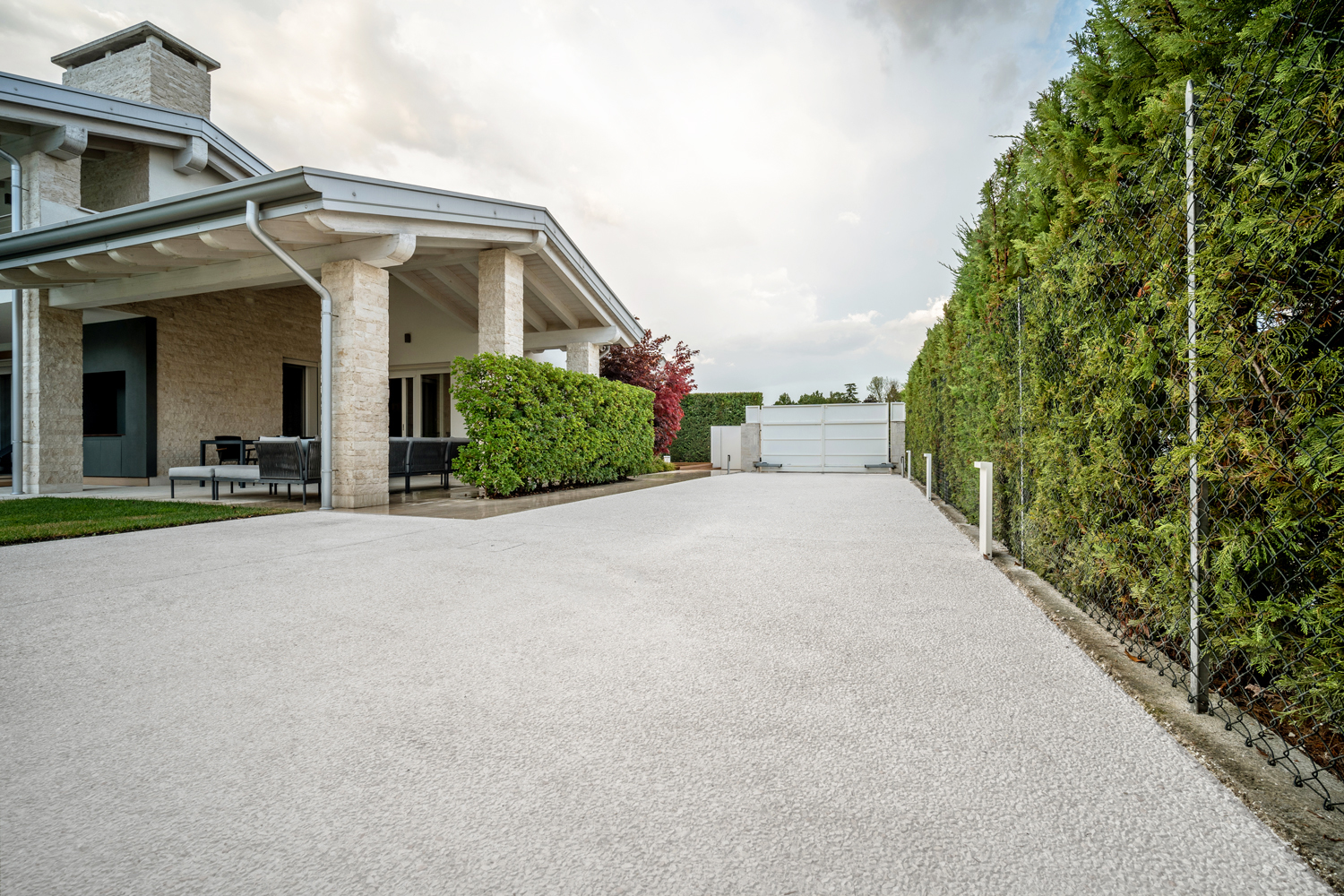 An ItalianTerrazzo concrete floor for driveway entrance - Isoplam
